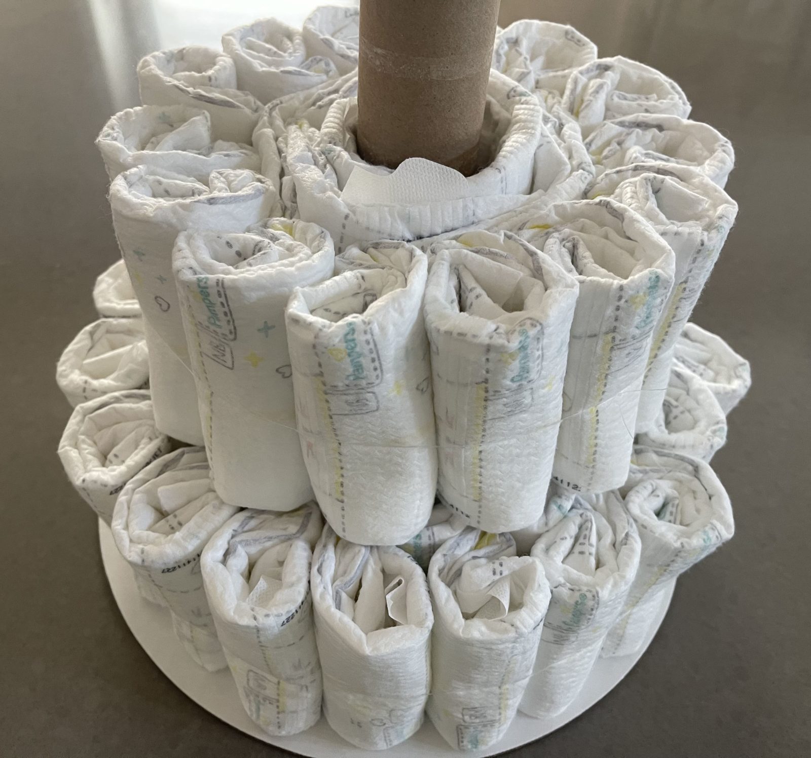 How to Make a Diaper Cake for a Baby Shower - JetsetChristina
