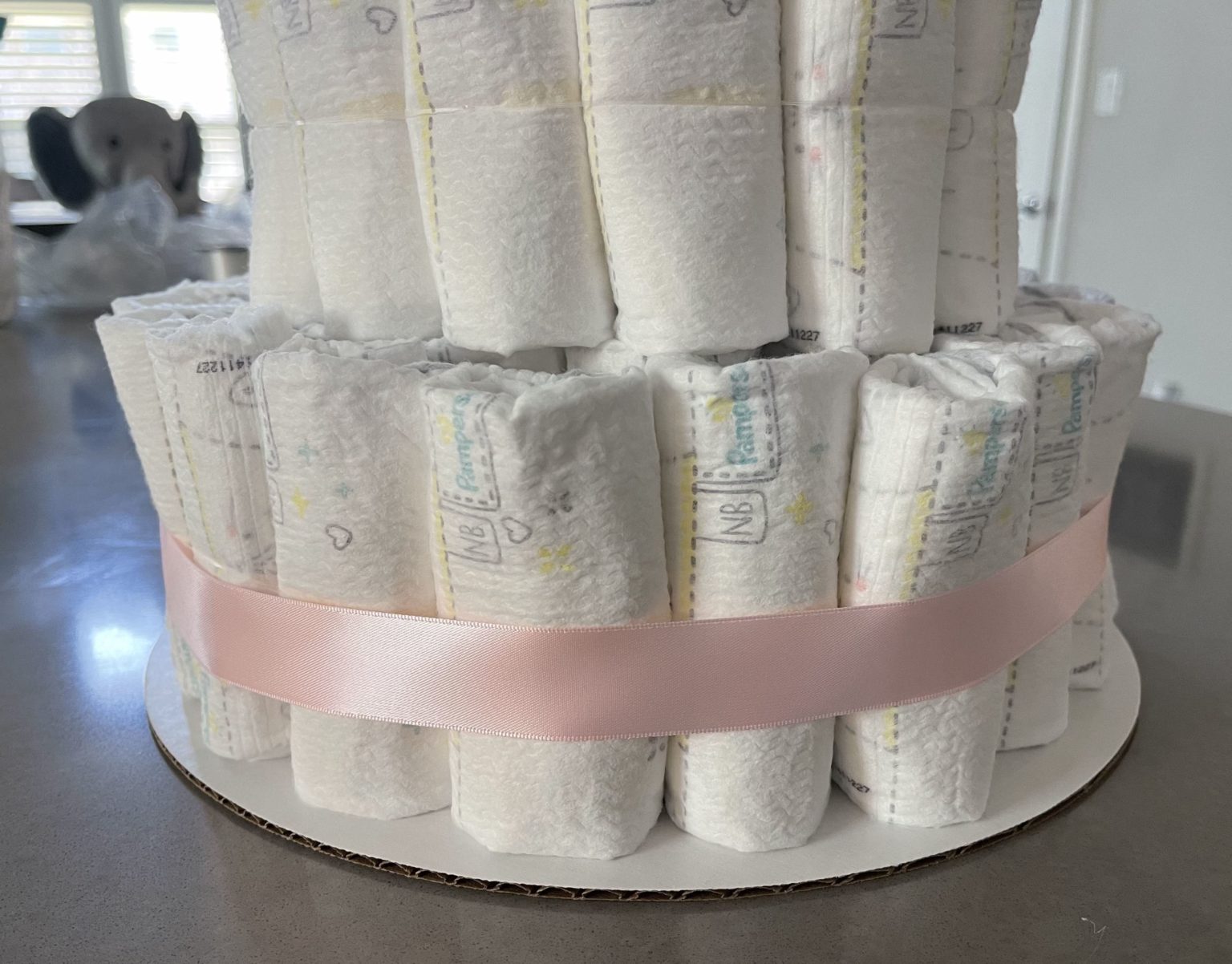 How to Make a Diaper Cake for a Baby Shower - JetsetChristina